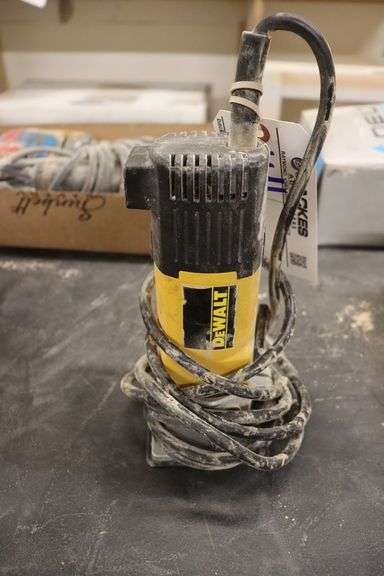 DeWalt DW670 electric trim router - Backes Commercial Auctioneers