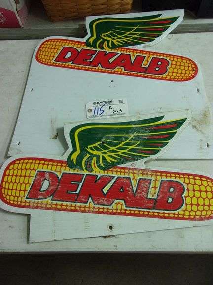 Pair of 24" x 19" Dekalb corrugated signs - Backes Commercial Auctioneers