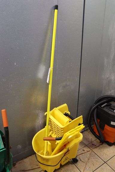 Rubbermaid yellow mop bucket with mop & caution sign - Backes ...