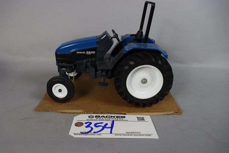 Farm Progress Show 1996 New Holland 5635 die cast tractor with rollbar ...