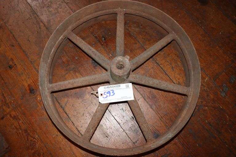 24" vintage steel wheel - Backes Commercial Auctioneers