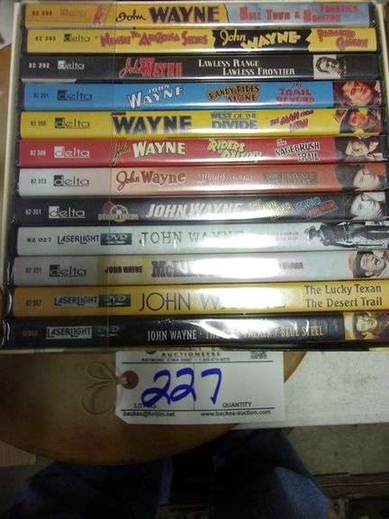 John Wayne DVDs - Backes Commercial Auctioneers