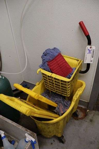 Yellow mop bucket with mop & caution sign - Backes Commercial Auctioneers