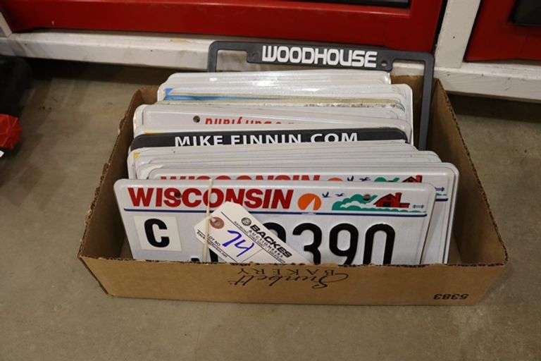 Box flat to go - Assorted license plates - Backes Commercial Auctioneers