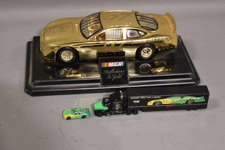 RC 24K Gold Chad Little race car w/ box - Backes Commercial Auctioneers