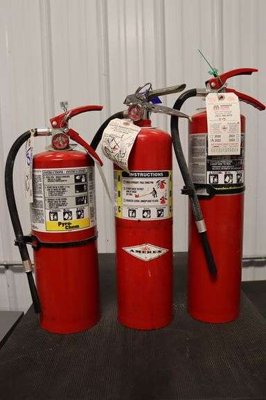 Times 3 - assorted fire extinguishers - Backes Commercial Auctioneers