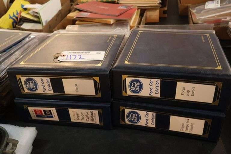 Binders - 4 binders of all Ford dealership pamphlets - see pictures for ...