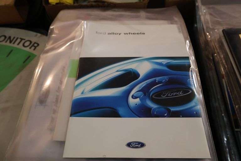 Binders - 2 binders of Ford accessories and more - Backes Commercial ...