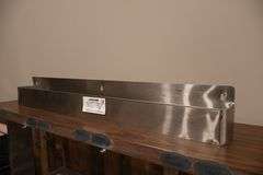 46" stainless speed rail - Backes Commercial Auctioneers