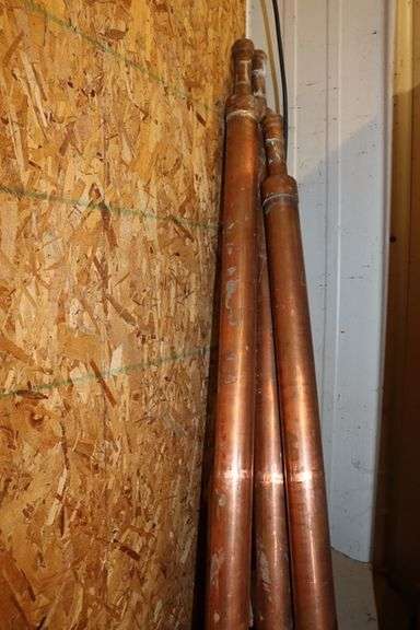 All to go - Assorted Copper tubes/sticks in corner - Backes Commercial ...