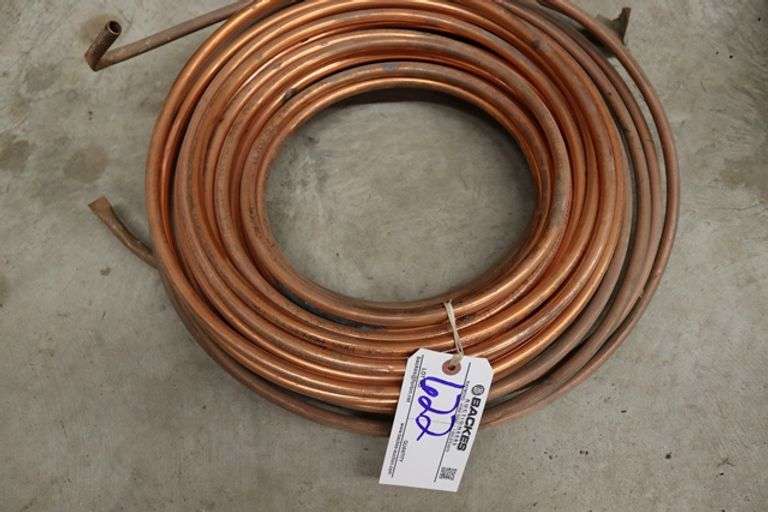 All to go - 2 Rolls copper water line - Backes Commercial Auctioneers