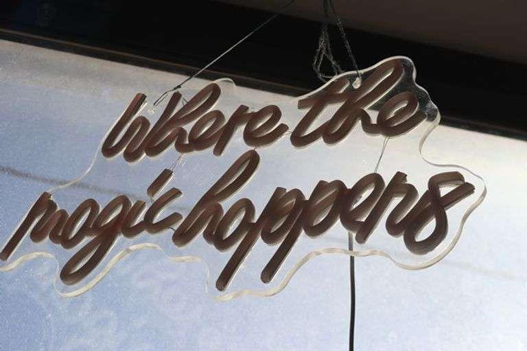 Where the Magic Happens led lighted sign - Backes Commercial Auctioneers