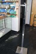 Single tree chrome display rack - Backes Commercial Auctioneers