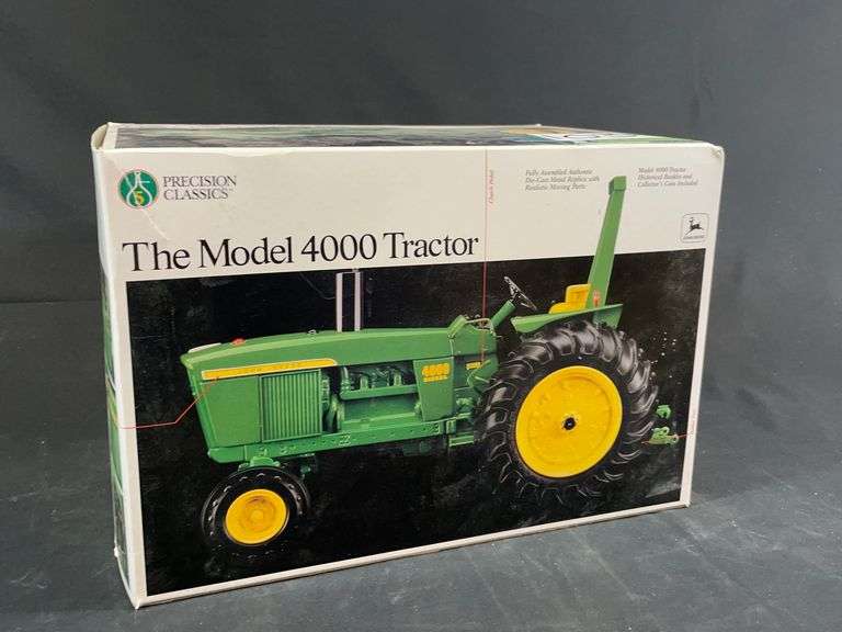 John Deere Model 4000 Toy Tractor - Booker Auction Company