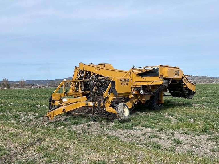 2008 Double L 973-HD 4 Row Harvester - Booker Auction Company