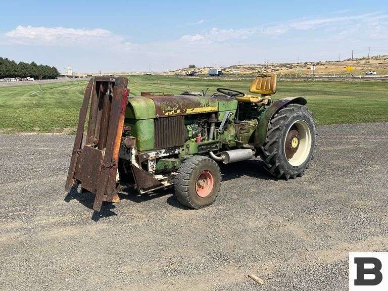 John Deere 1020 Tractor - Booker Auction Company