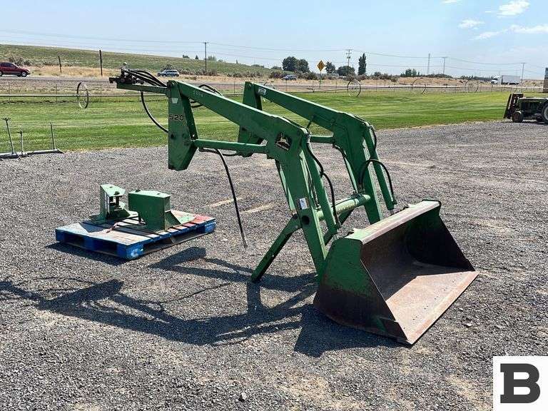 John Deere 520 Loader - Booker Auction Company