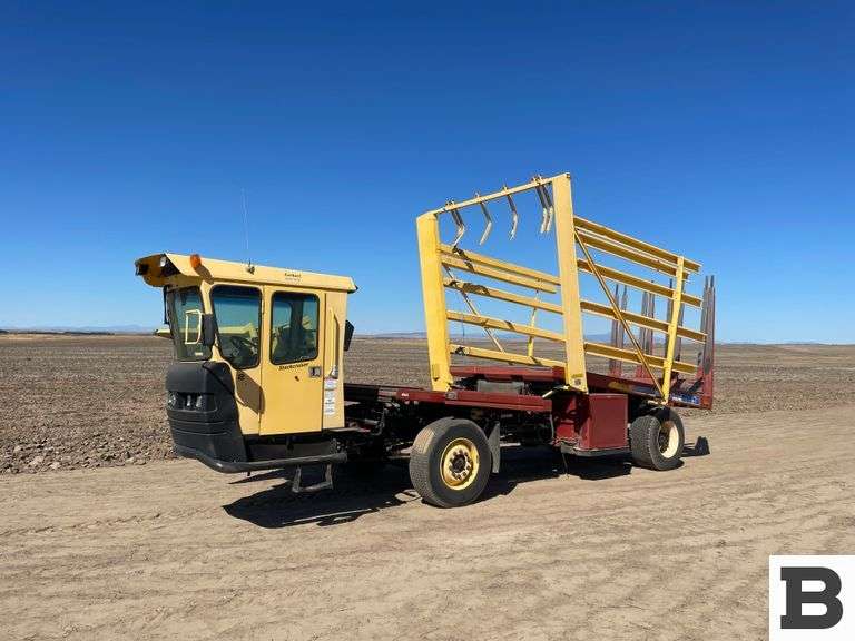 2008 New Holland H9880 Bale Wagon - Booker Auction Company