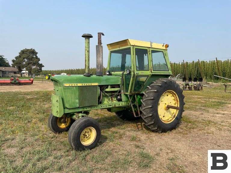 John Deere 4320 Tractor - Booker Auction Company