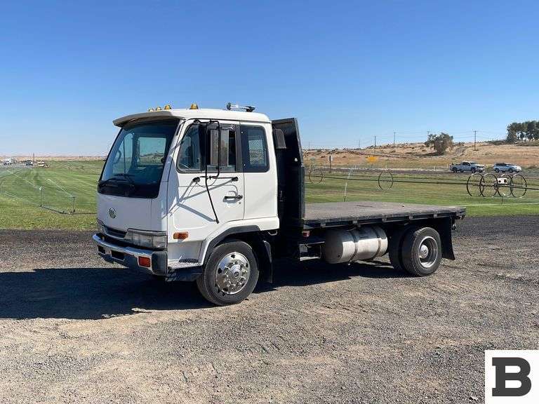 2000 UD 2300 Flatbed Truck - Booker Auction Company