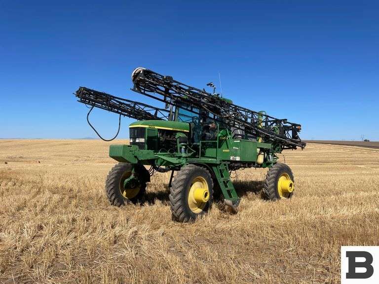 2000 John Deere 4700 Sprayer - Booker Auction Company