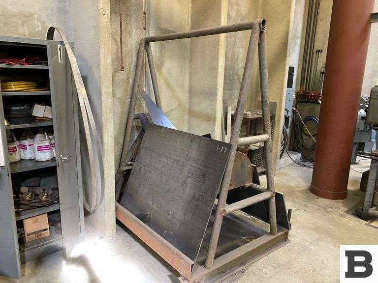 A Frame Metal Rack and Contents - Booker Auction Company