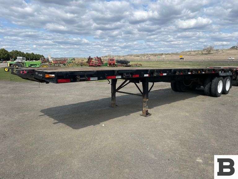 1971 Brown Flatbed Lead Trailer - Booker Auction Company