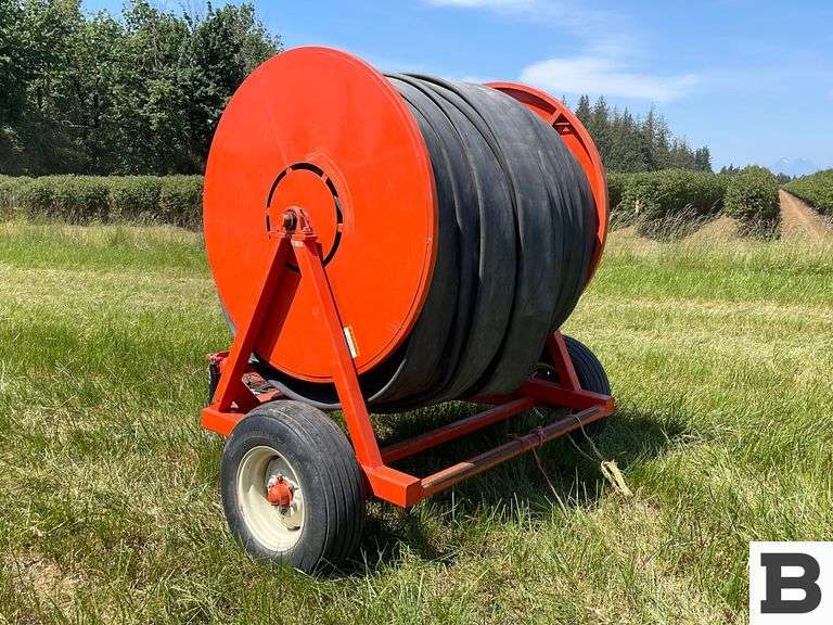 Whatcom Mfg Layflat Hose Reel w/ 6" Camlock Hose - Booker Auction Company