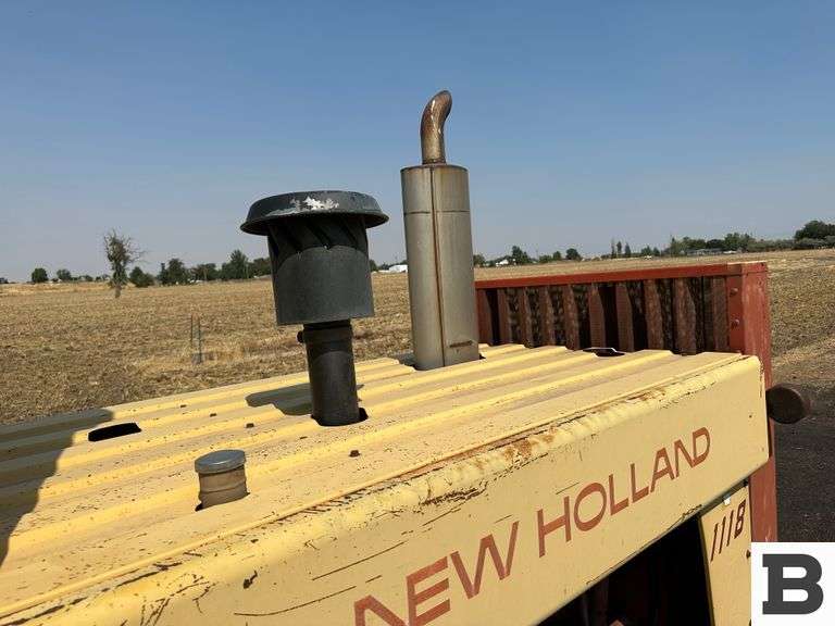 New Holland 1118 Swather - Booker Auction Company