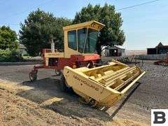 New Holland 1118 Swather - Booker Auction Company