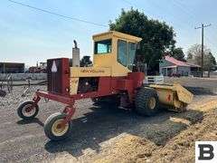 New Holland 1118 Swather - Booker Auction Company
