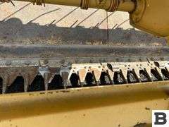 New Holland 1118 Swather - Booker Auction Company