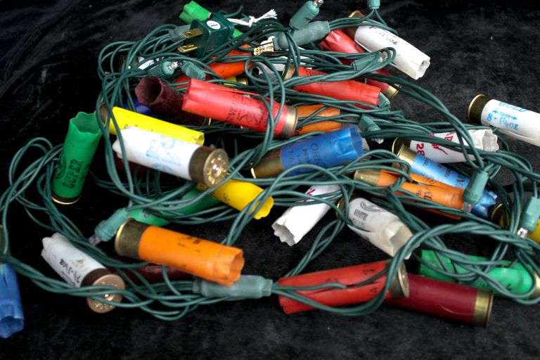 Appear to be folk-art spent Shotgun shell string lights. - Bunting ...