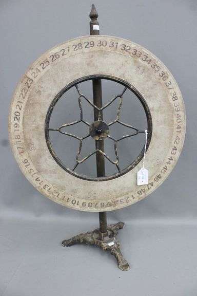 Vintage wheel of chance/gaming wheel with metal base, 29.5" tall, 19 ...