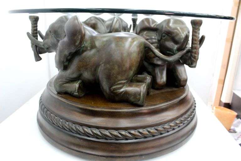 Bombay Company glass top coffee table with three elephant sculpture ...