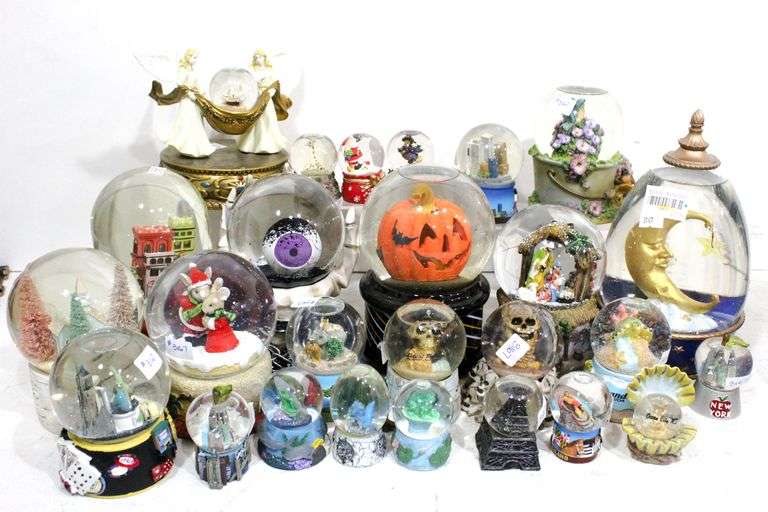 Collection of snow globes - holidays, movie characters, and more ...