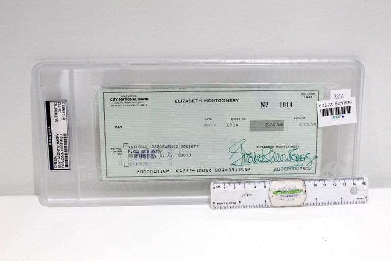 Elizabeth Montgomery Signed check , PSA / DNA authenticated , in case ...