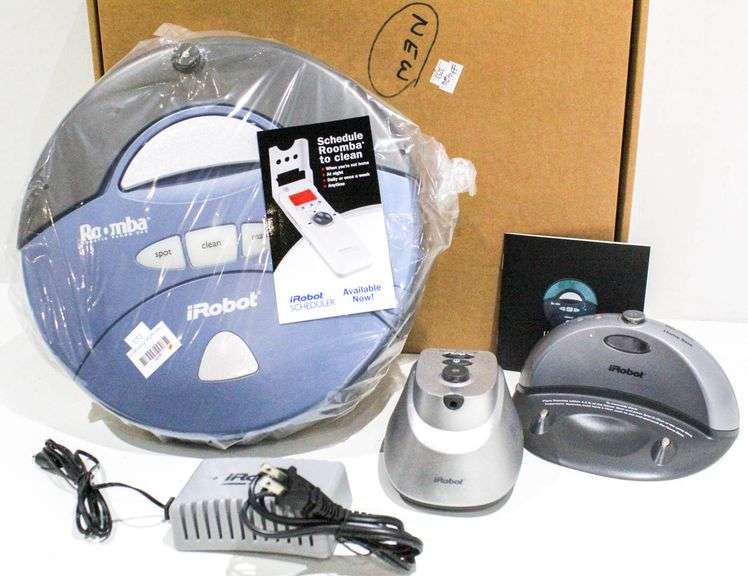 iRobot Roomba robotic floor vac, includes charger and accessories in ...