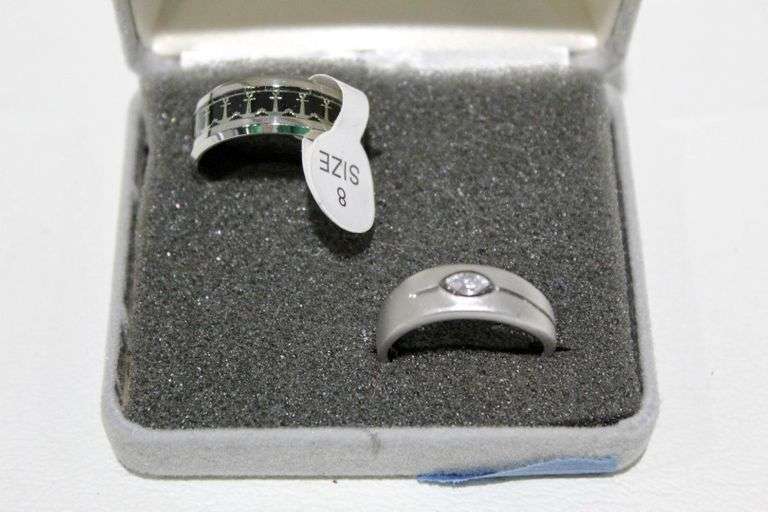 Two Rings, one with black detail and one marked 925 - Bunting Online ...