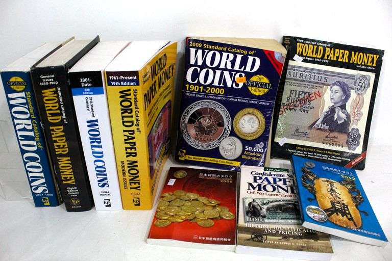 Currency Book Collection, includes World Coins, World Paper Money, and ...