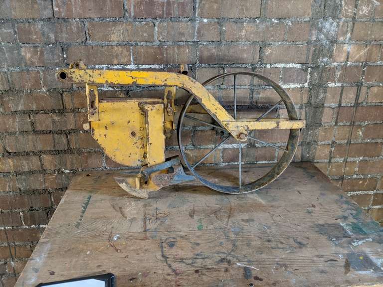 vintage yellow rototiller planter - Bid On Estates Auction Services
