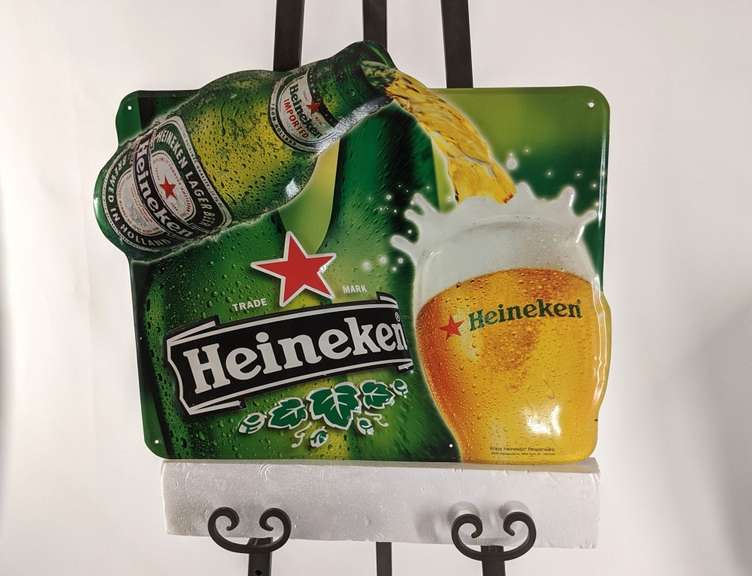 Stamped Metal Heineken Beer Sign - Bid On Estates Auction Services