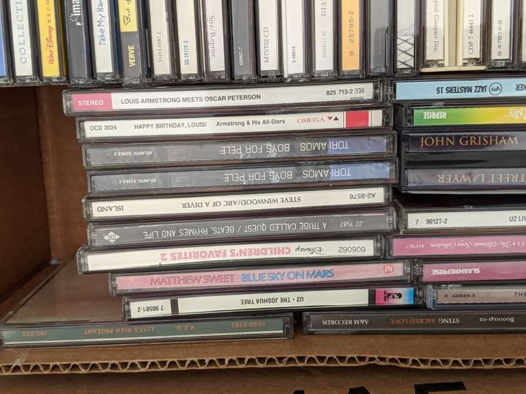 2 Boxes of 1990s Era CDs - Bid On Estates Auction Services