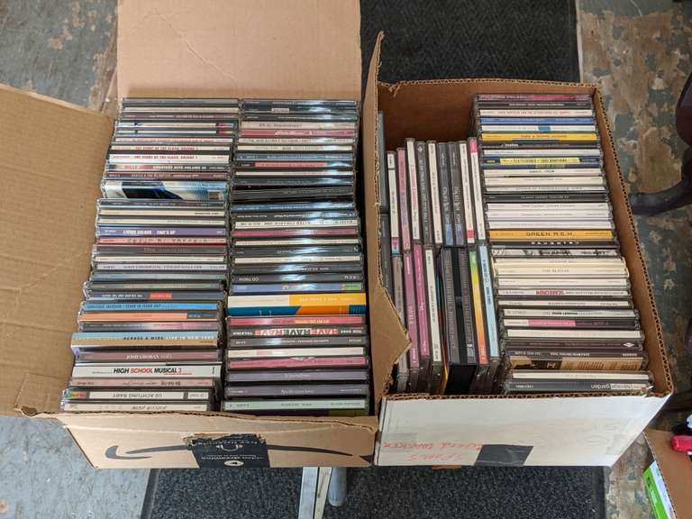 2 Boxes of 1990s Era CDs - Bid On Estates Auction Services
