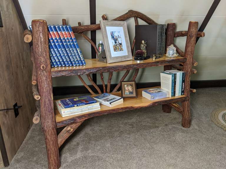 Rustic Open Log Bookcase - on second floor. (no other contents, just ...