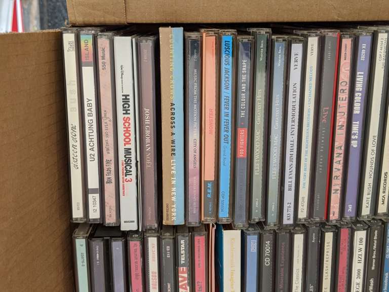 2 Boxes of 1990s Era CDs - Bid On Estates Auction Services