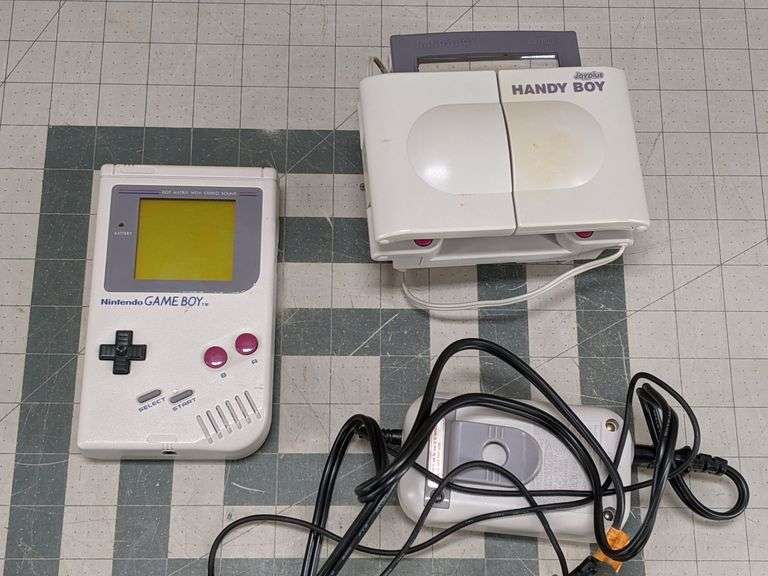 NINTENDO GAMEBOY, HANDY BOY, AND POWER PACK (GAMEBOY POWERED ON AND ...