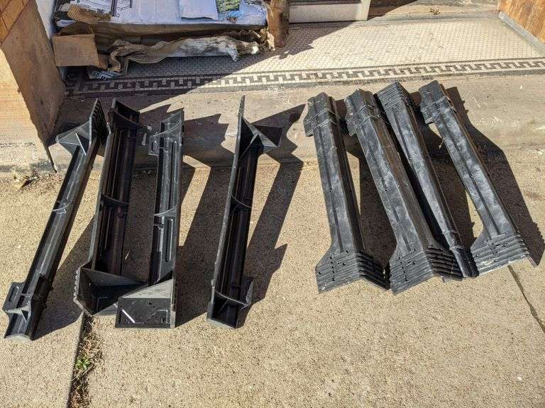 2 Sets of Heavy Plastic Workbench Legs - Bid On Estates Auction Services