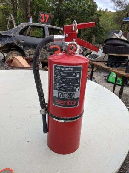 Sentry Fire Extinguisher (appears serviceable) - Bid On Estates Auction ...