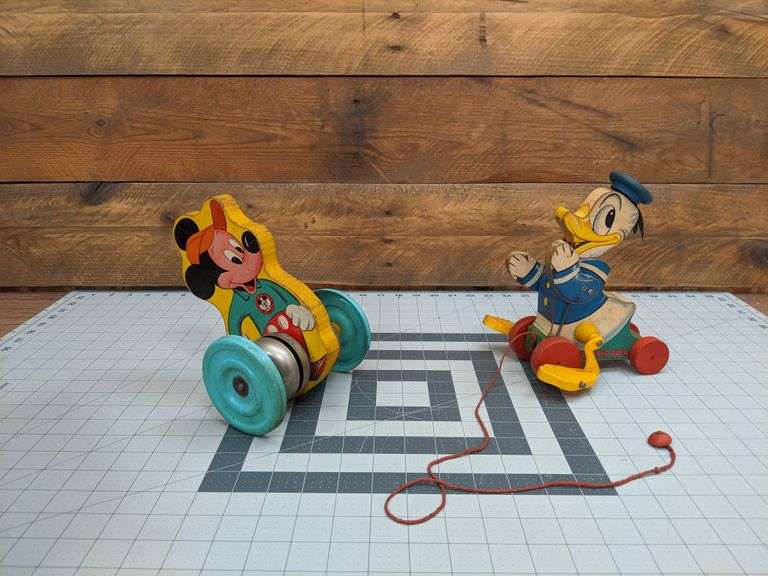 Wooden Mickey and Donald Push / Pull Toys - Bid On Estates Auction Services